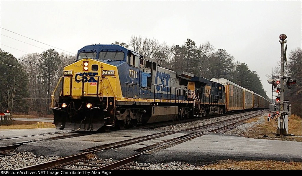 CSX C40-8 7711 and ES40DC 5235 cross Crestwood Rd